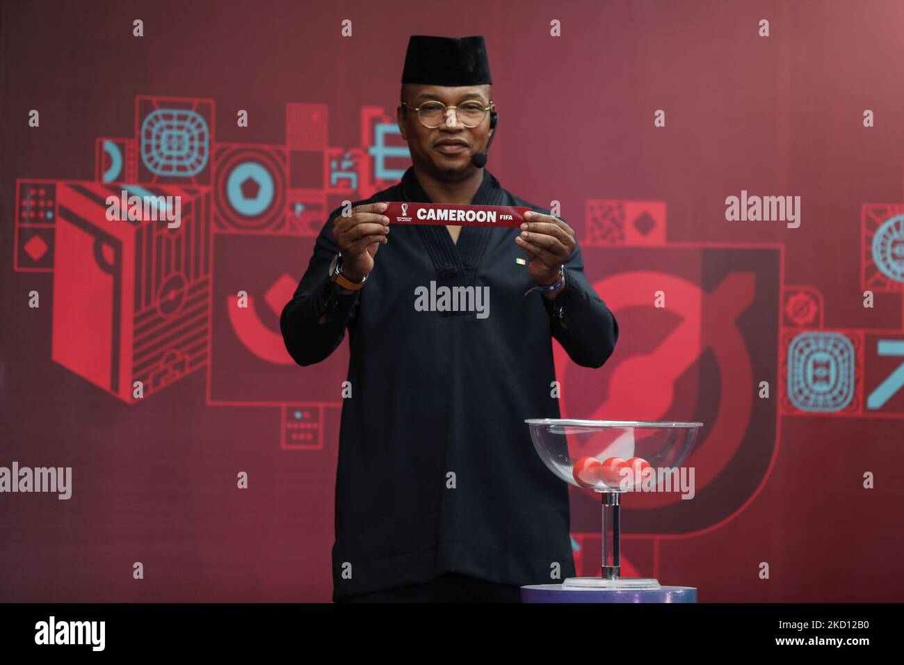 The Legend El Hadji Diouf draws the card of Cameron during FIFA World ...