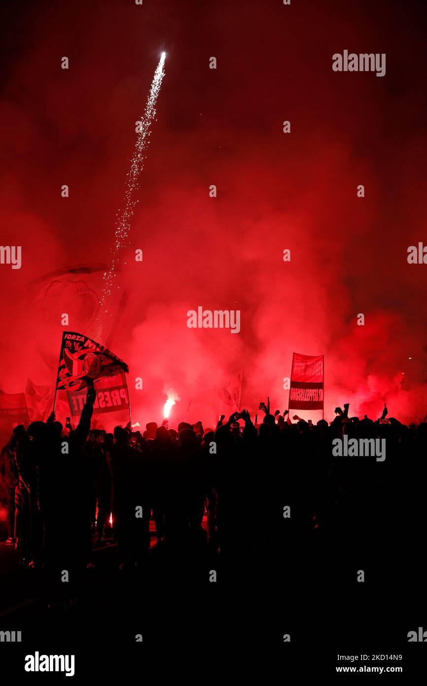 AC Milan Curva Sud fans light smoke bombs and sing outside the stadium ...