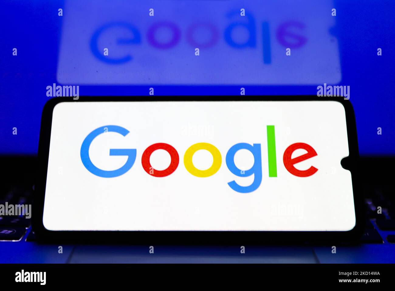 Google logo is displayed on a mobile phone screen for illustration ...