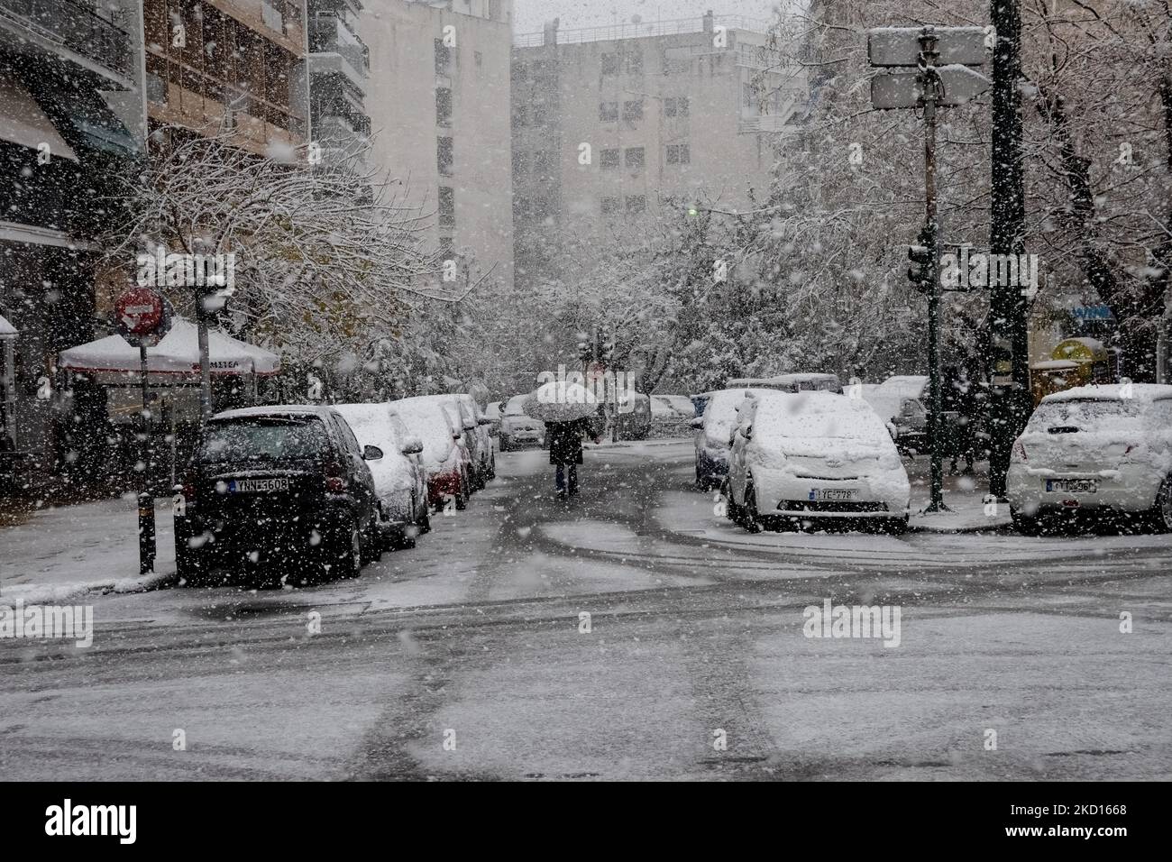 A genral view of a street during snowfall named 'Elpida' in the center ...