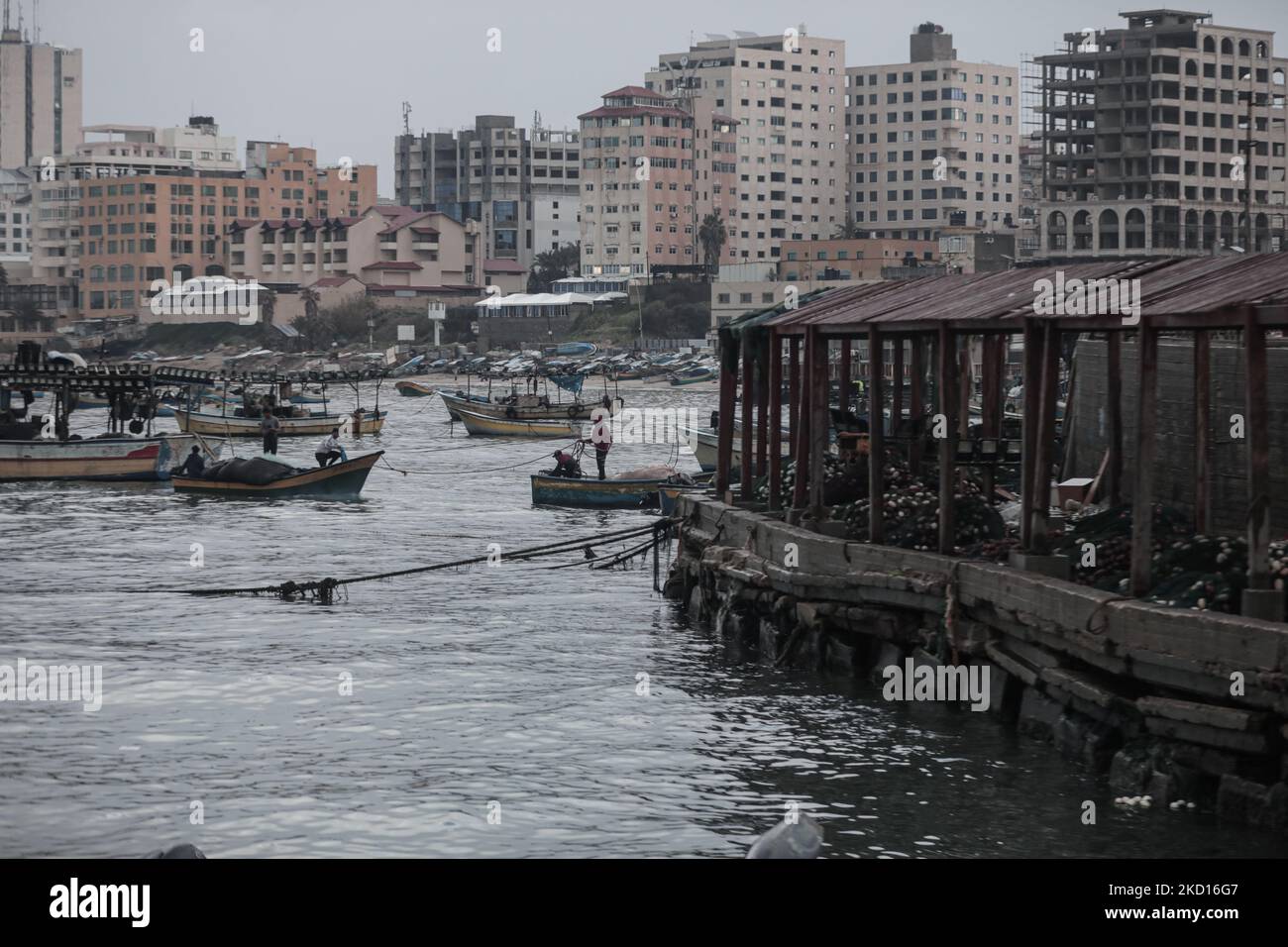 Palestinian fishermen boats anchor on Gaza sea port, during a rainy ...