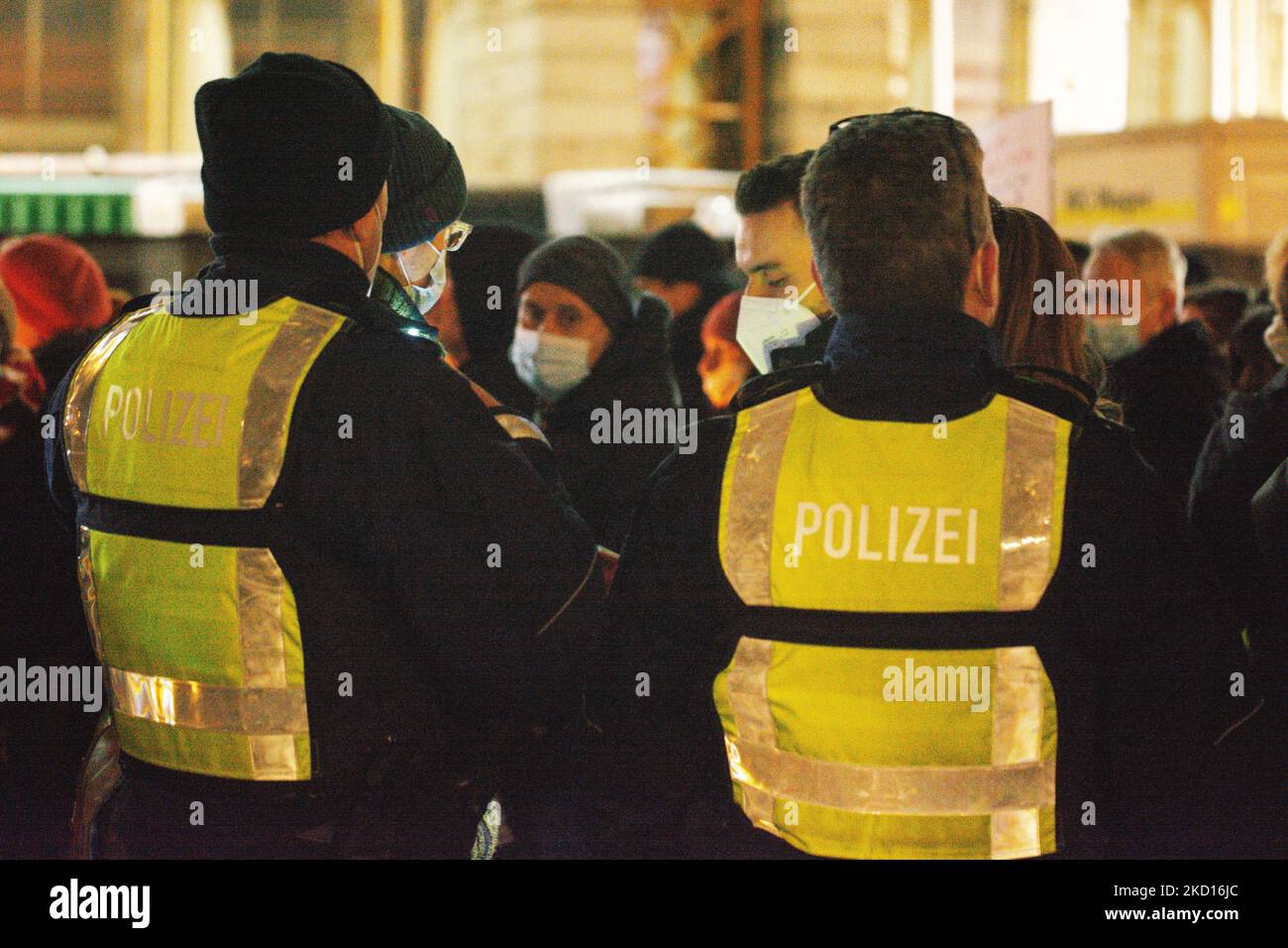 polices are seen checking the mask mandatory for the crowd of ...