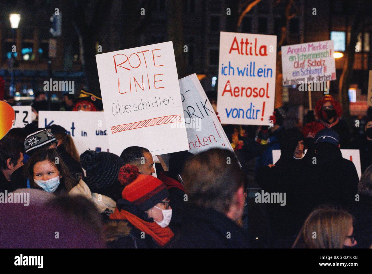 counter protesters are seen holding the signs against anti vaccination ...