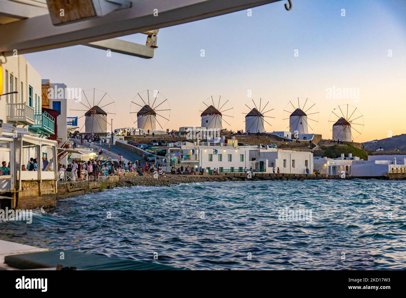 The iconic windmills of Mykonos island as seen from Little Venice with ...
