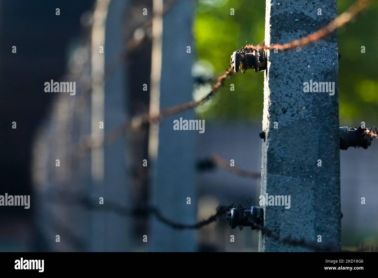 Barb wired fences at the former Nazi German Auschwitz I concentration ...