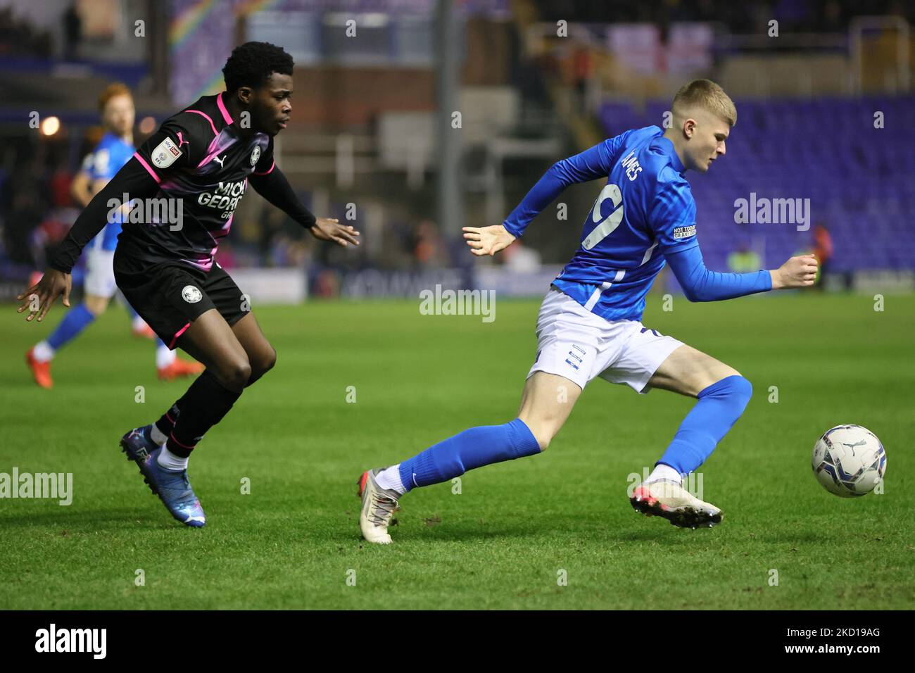 Jordan James of Birmingham City runs with the ball followed by Bali ...