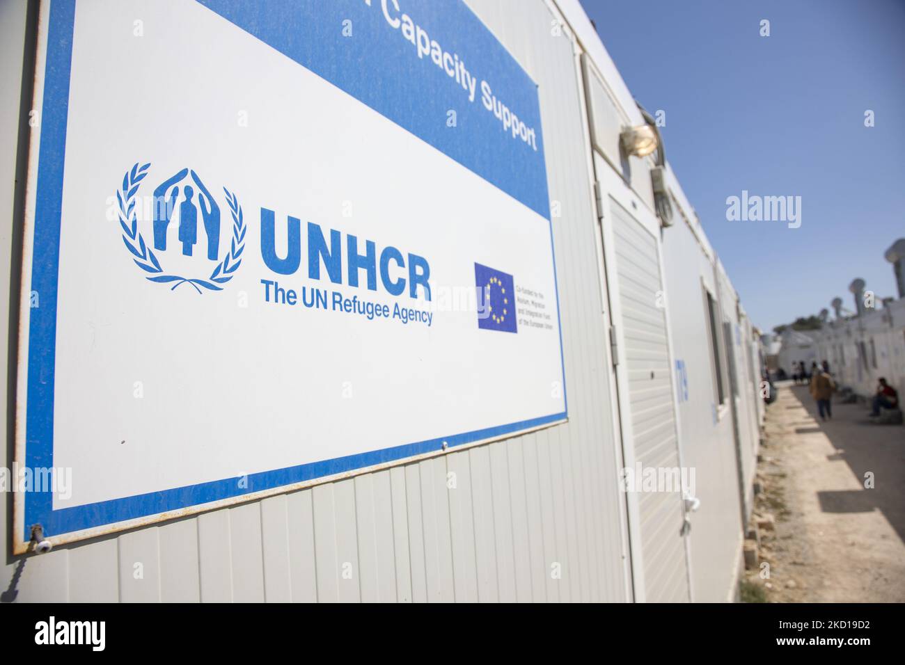 A sign with the UNHCR logo and European flag. Inside the new Refugee ...