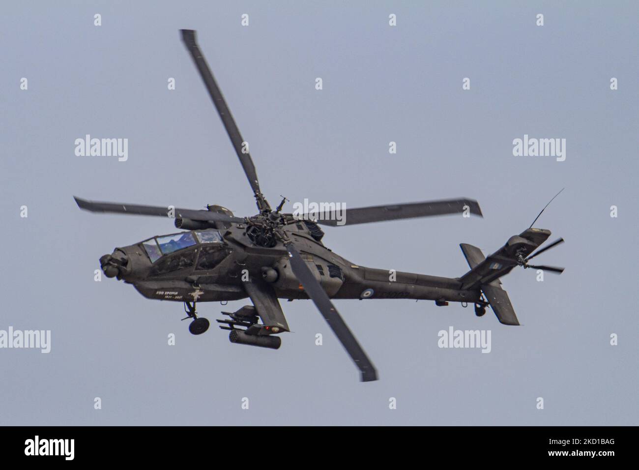 A Boeing AH-64 Apache helicopter from the Greek Army as seen flying and ...