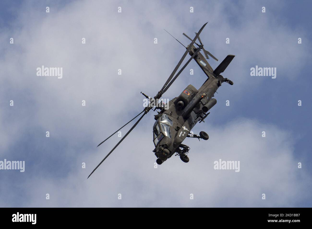 A Boeing AH-64 Apache helicopter from the Greek Army as seen flying and ...