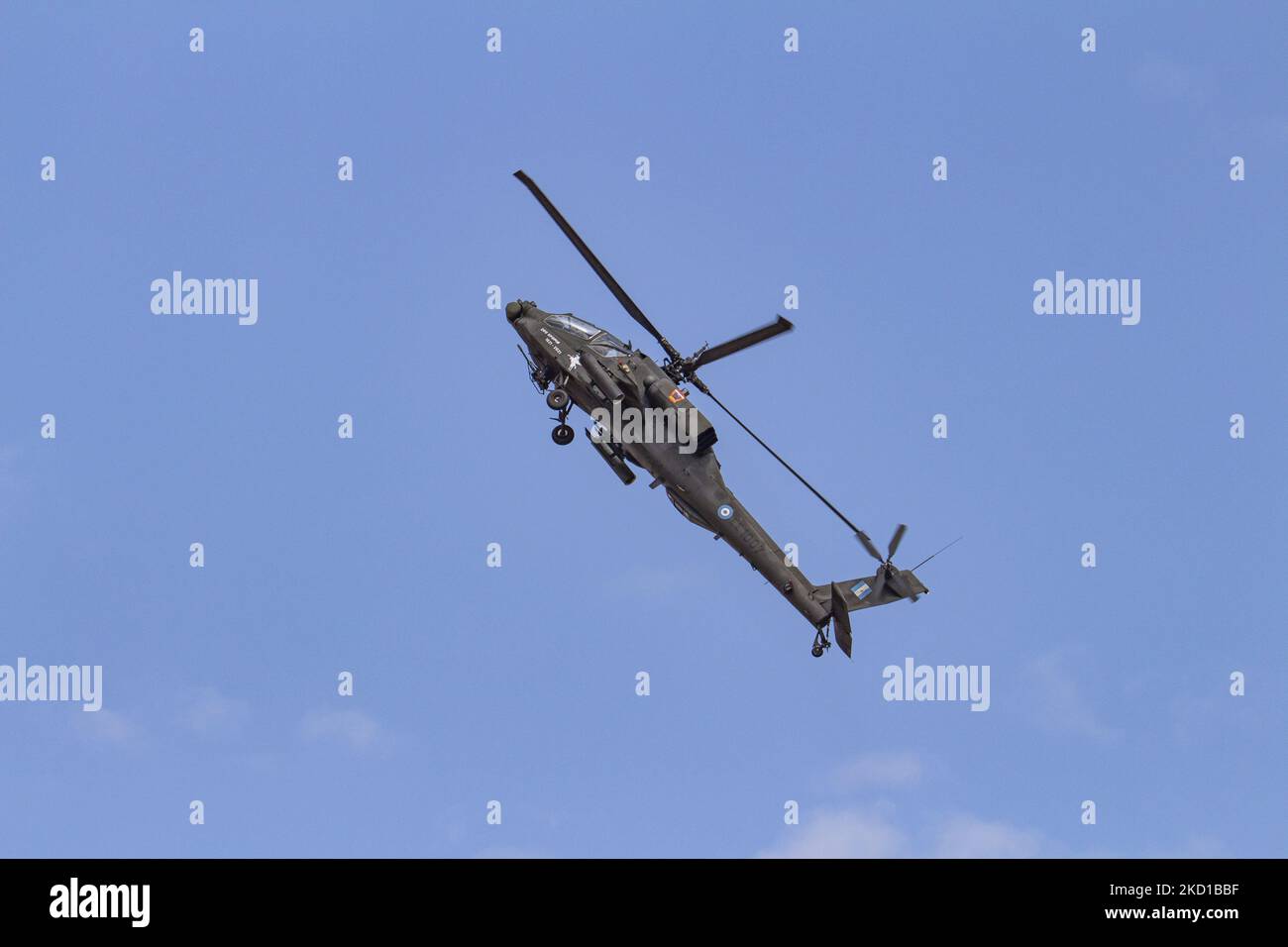 A Boeing AH-64 Apache helicopter from the Greek Army as seen flying and ...