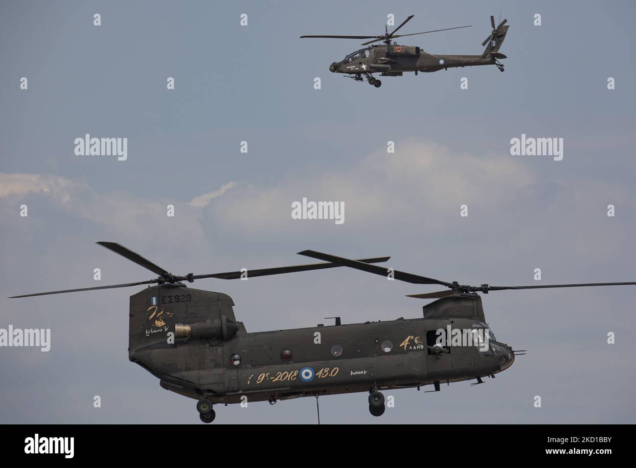 A Boeing AH-64 Apache helicopter from the Greek Army with a Boeing CH ...