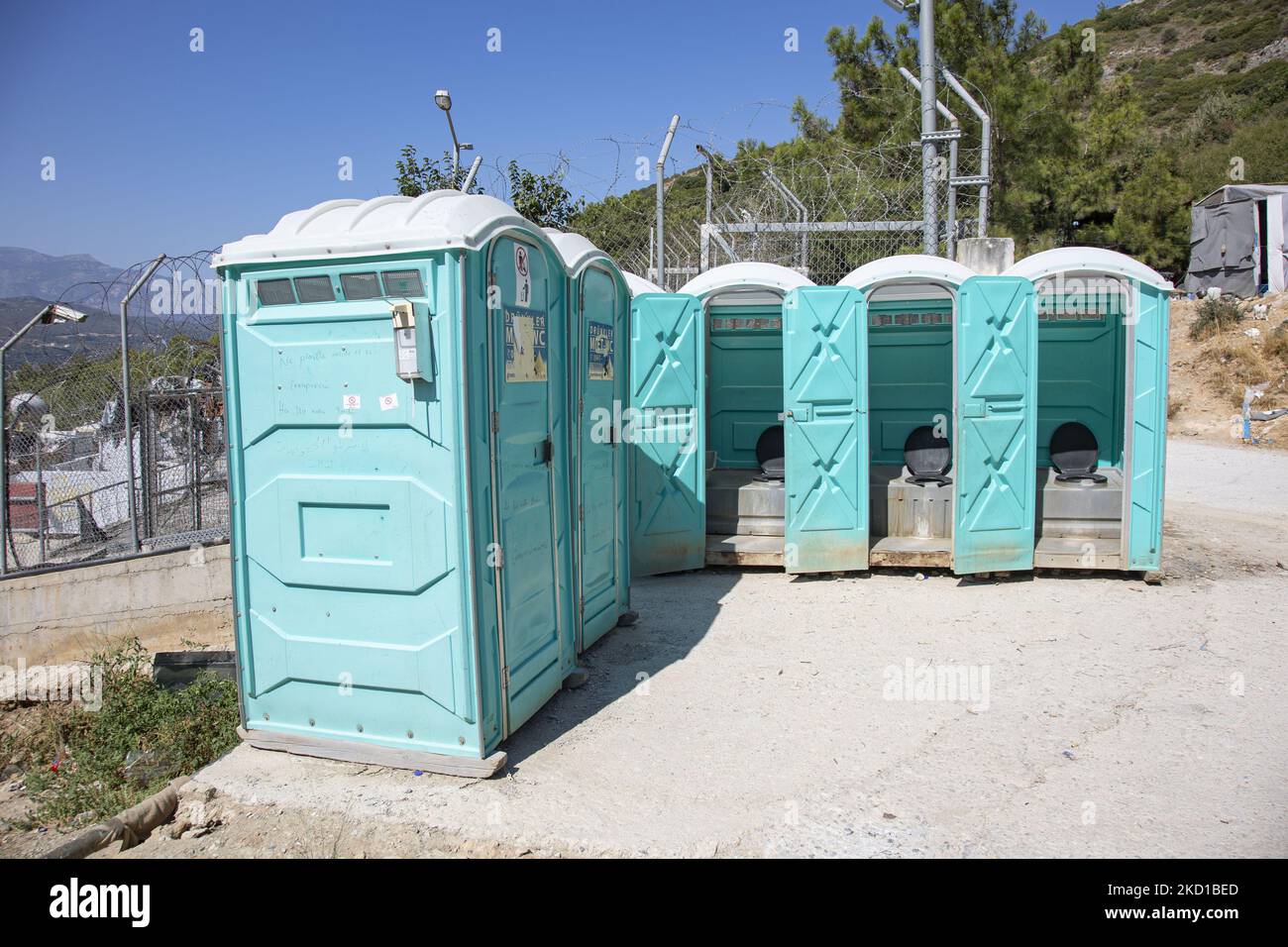 Portable toilets WC at the former official camp. The former official ...