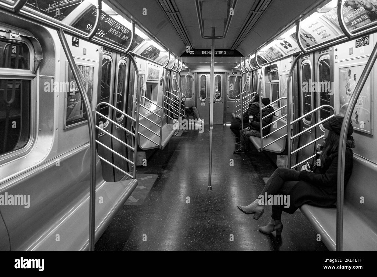 Inside a crowded metro train Black and White Stock Photos & Images - Alamy