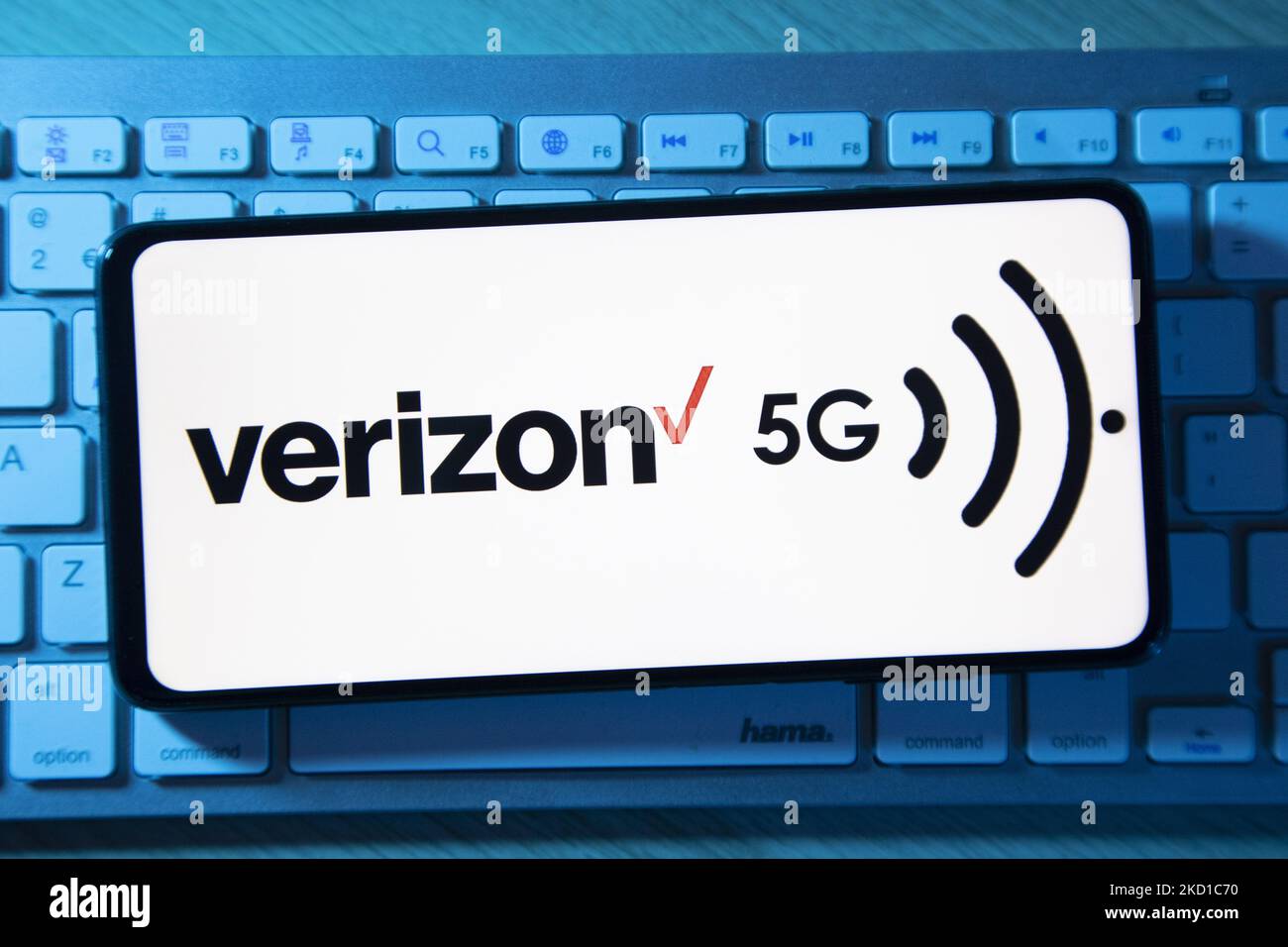 Photo illustration of a the Verizon logo and 5G signal. Verizon ...