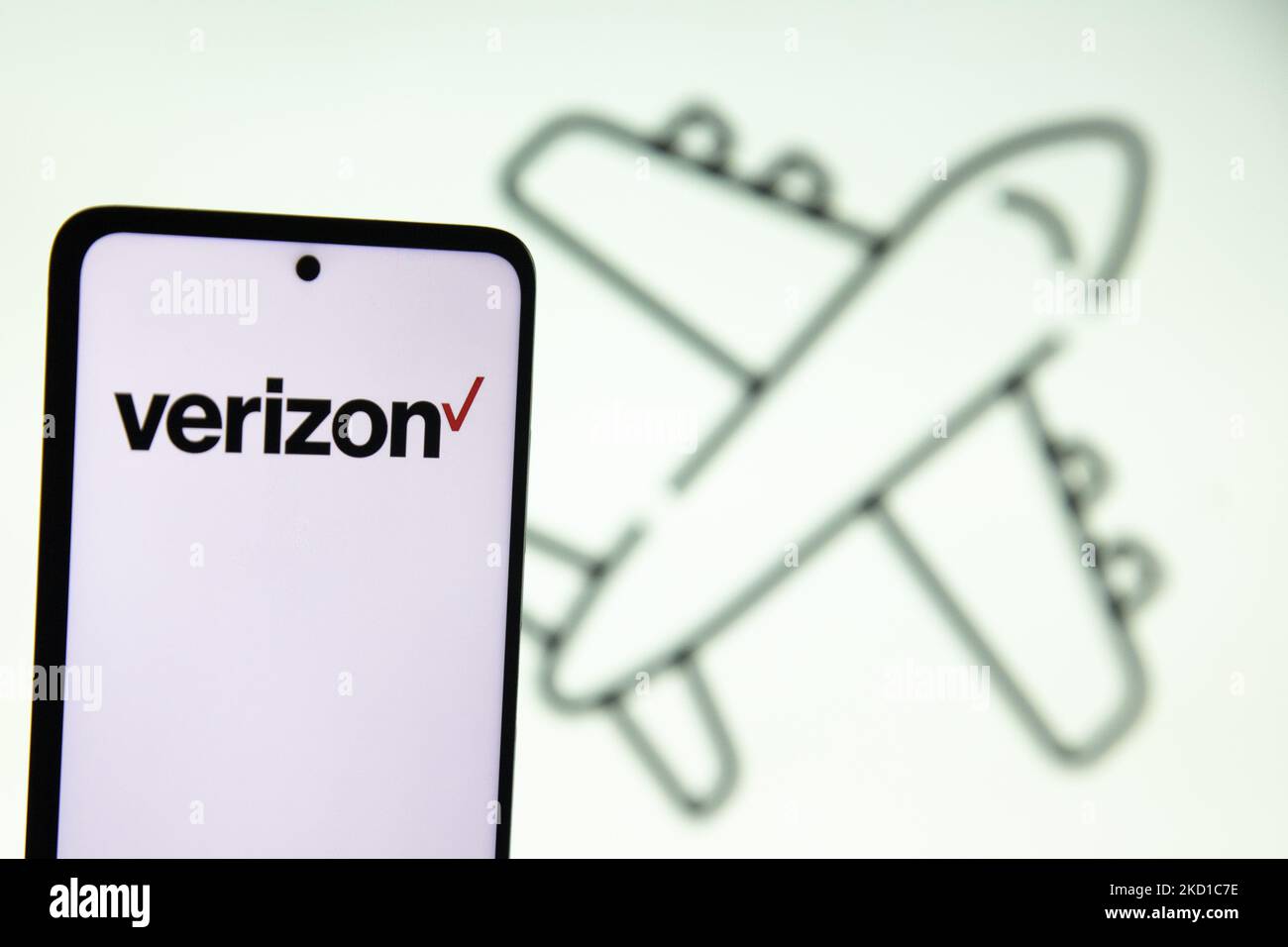 Photo illustration of a the Verizon logo and an airplane illustration ...