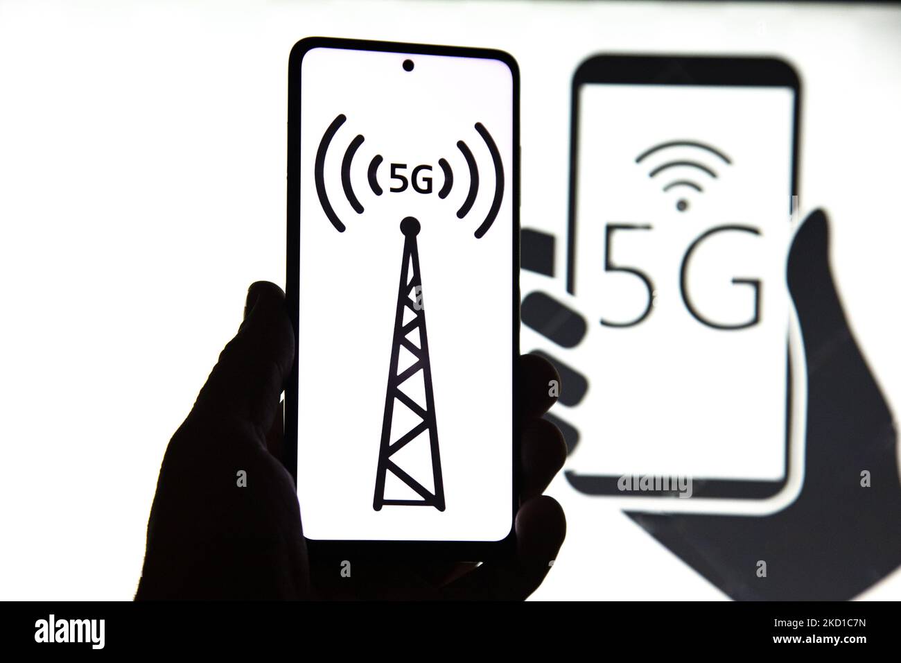 Photo illustration of a 5G signal from an antenna symbol logo displayed ...