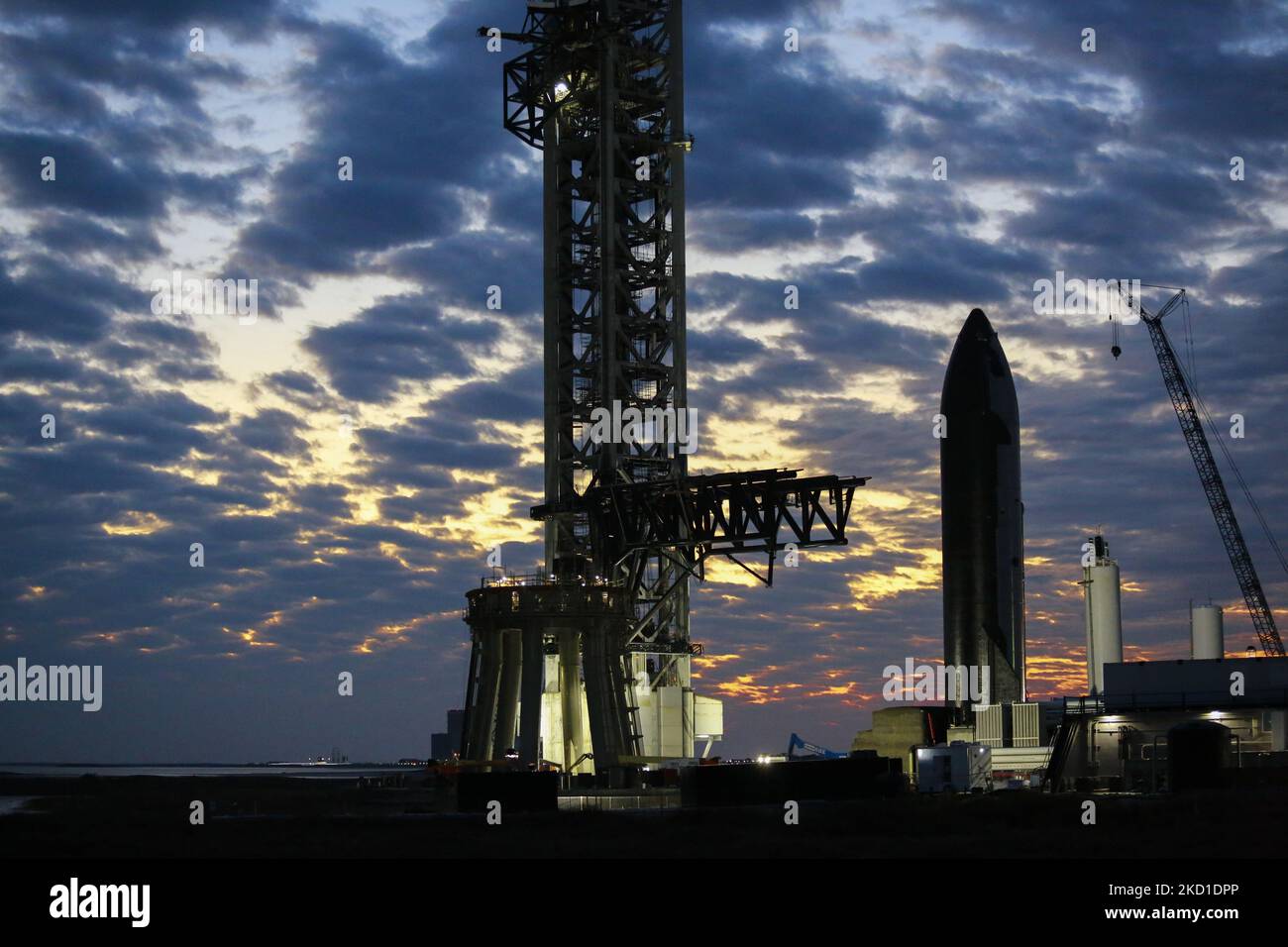 SpaceX Starship and the Orbital Launch Tower at sunset. (Photo by ...
