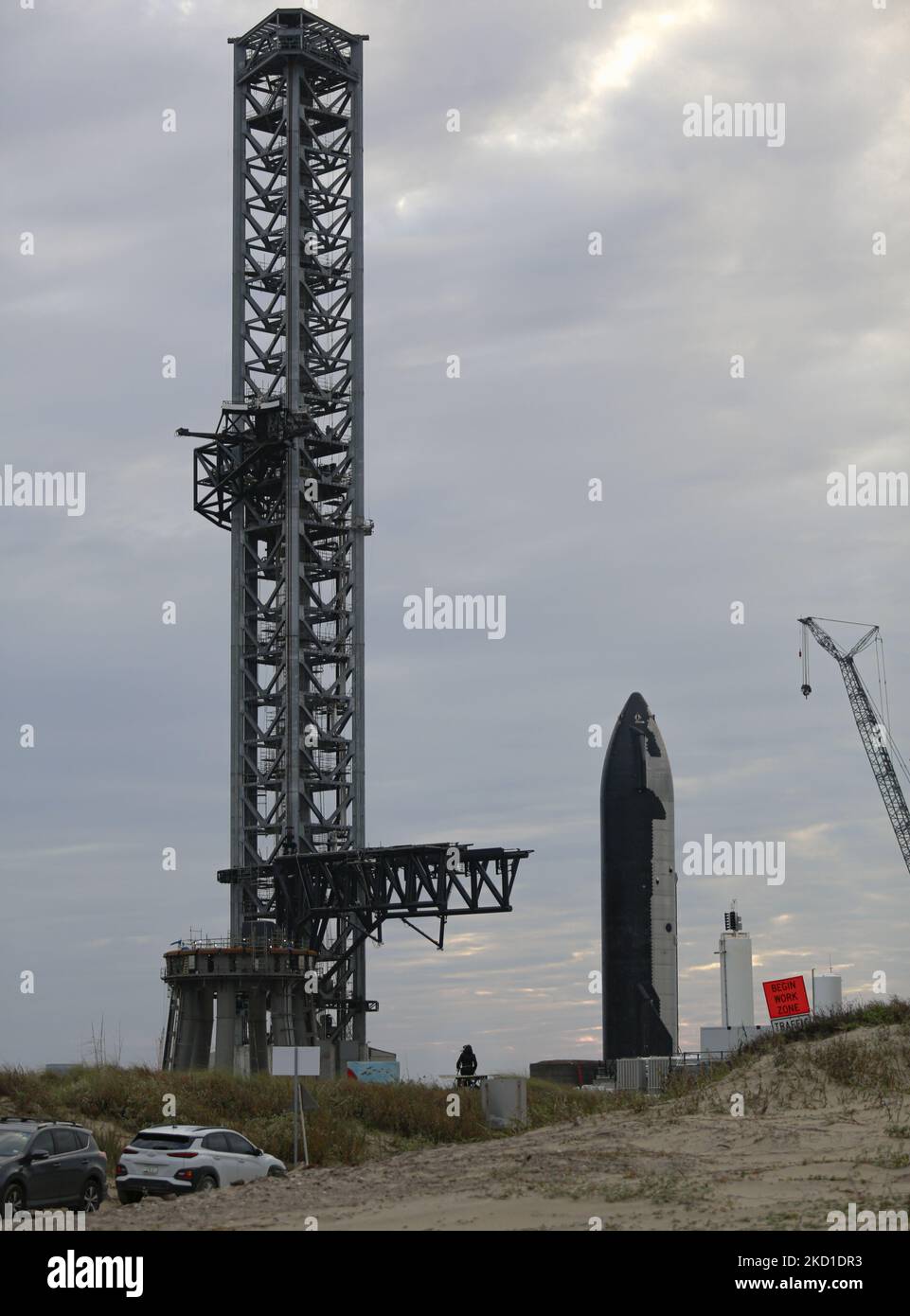 SpaceX live streamer Jessica Kirsh sits on a dune overlooking Starbase ...