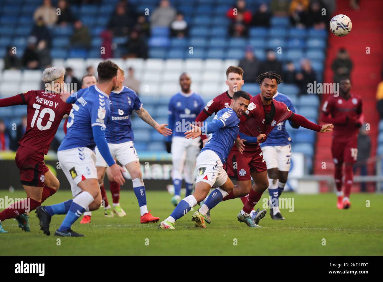 Jordan Clarke of Oldham Athletic grapples with Tahvon Campbell of ...