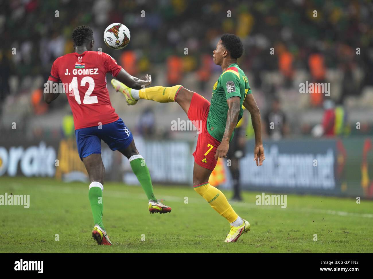 James Gomez of Gambia and Clinton N'Jie of Cameroon during Cameroon ...