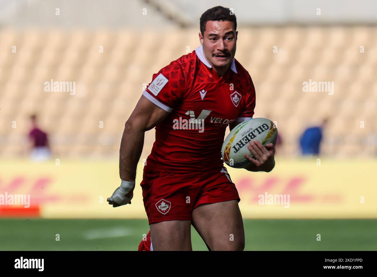 Elias Ergas of Canada runs with the ball during the Men's HSBC World ...