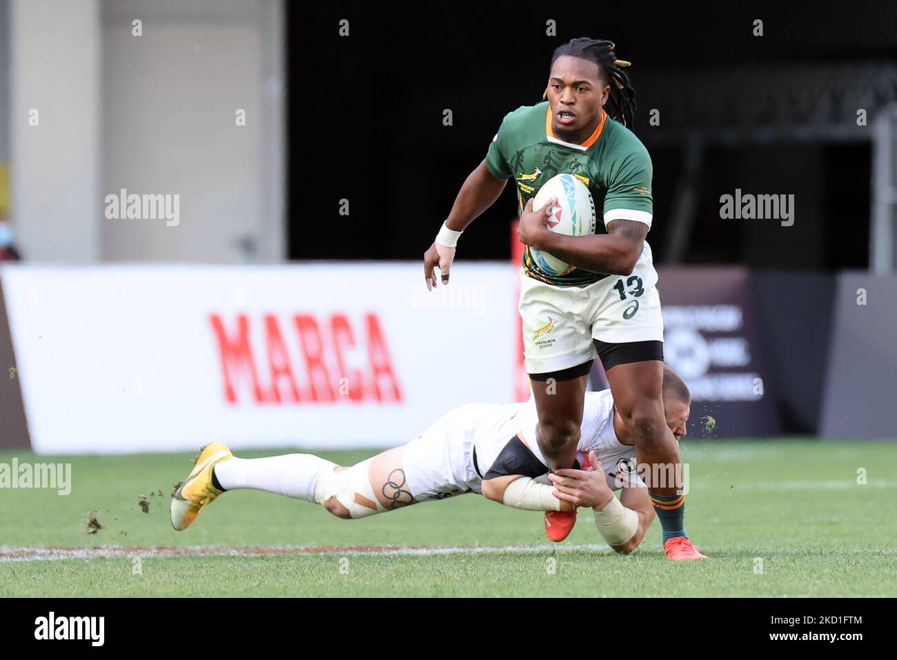 Darren Adonis of South Africa runs with the ball during the Men's HSBC ...