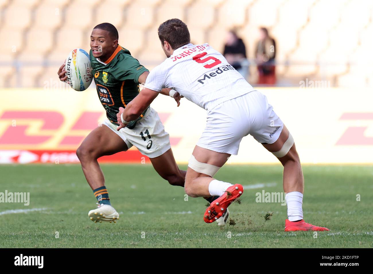 Shaun Williams of South Africa runs with the ball during the Men's HSBC ...