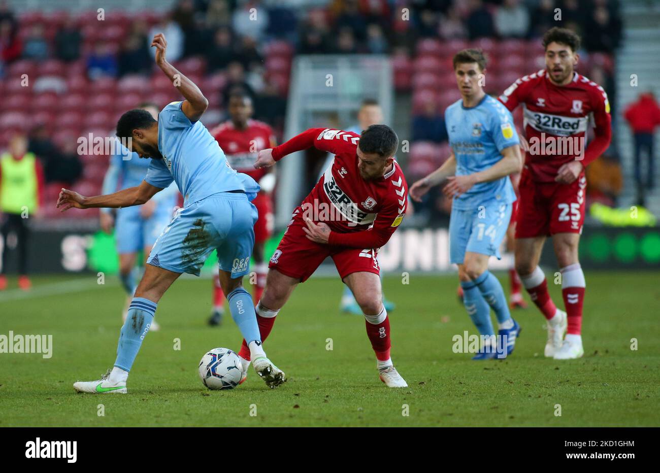 Middlesbrough's Aaron Connolly tackles Coventry City's Jake Clarke ...