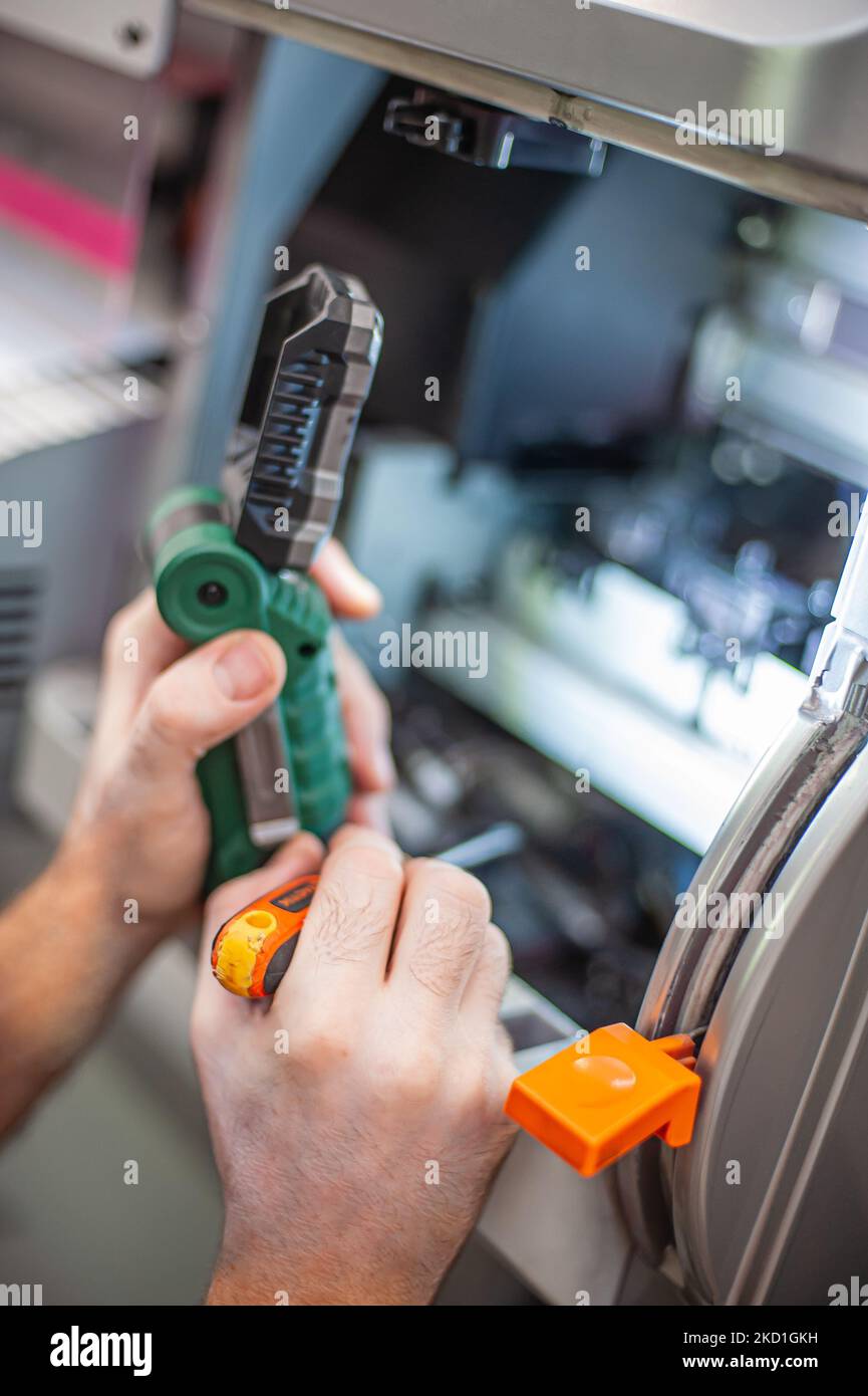 Office machine repairer hi-res stock photography and images - Alamy