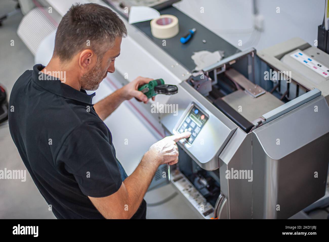 All machines nead maintains. Professional technician troubleshooting ...