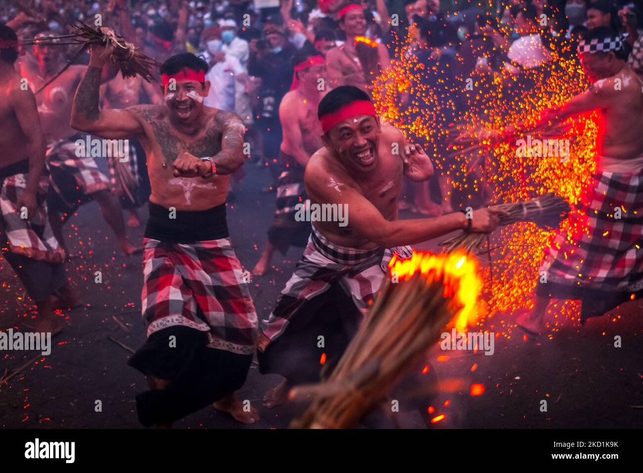 The indigenous people of Duda village, Bali, Indonesia held a fire war ...