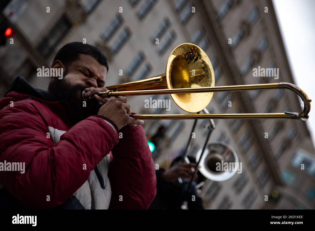 A member of the Too Much Talent Band plays a wind instrument during a ...