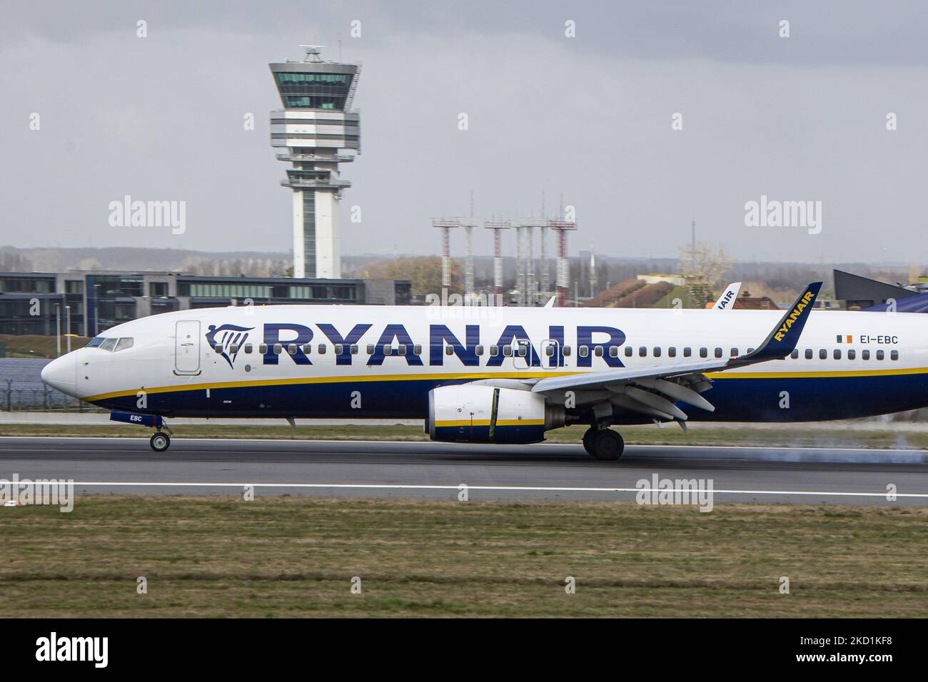 Close-up of the Ryanair plane with the cockpit, wings and jet engine ...