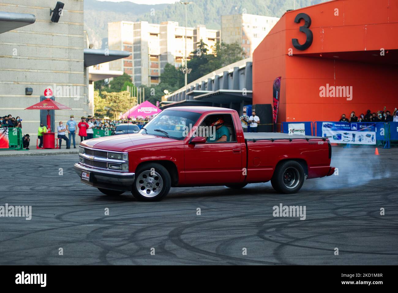 A driver in a V8 chevrolet pickup during the MCM Show 2022 auto show in ...