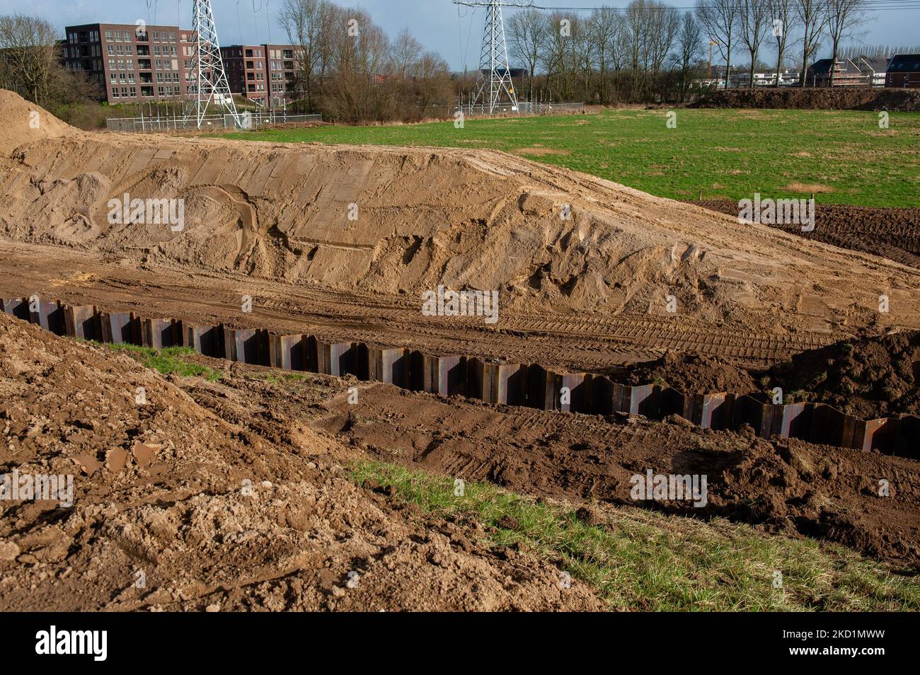 A view of the sheet piles already placed inside the ground around the ...