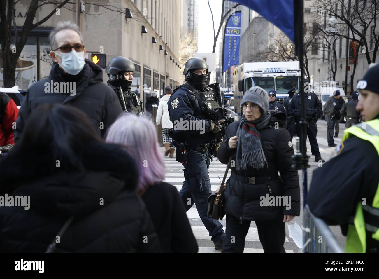 NYPD tactical unit patrols as people file into St. Patricks Cathedral ...
