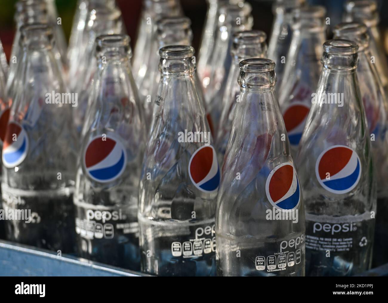 Empty Pepsi bottles at a street stand in San Juan Chamula. On Tuesday ...