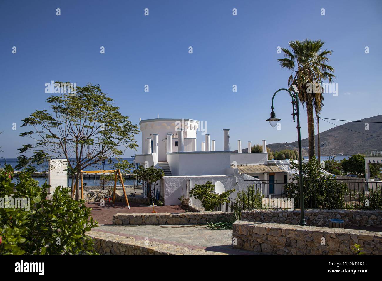 Livadia, the port and main village of Tilos island with the whitewashed ...