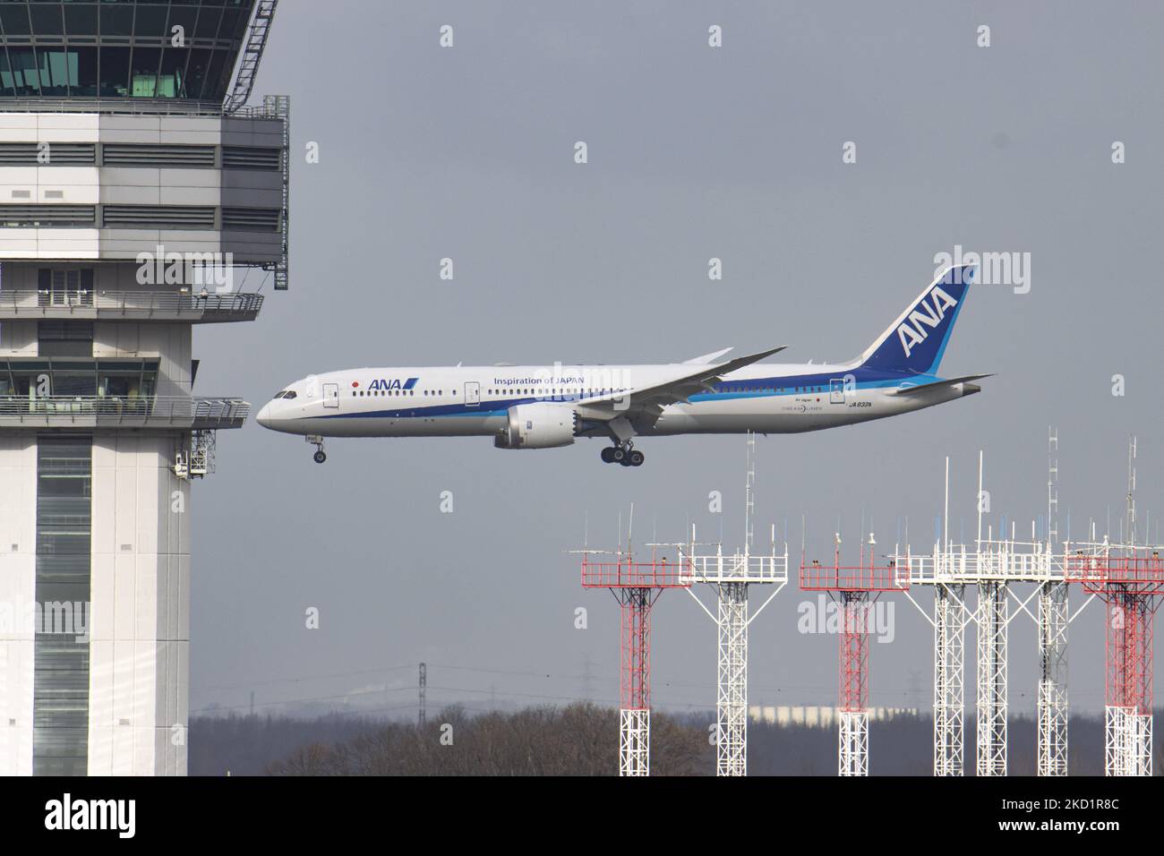 The Boeing 787 as seen flying behind the Control Tower. ANA All Nippon ...