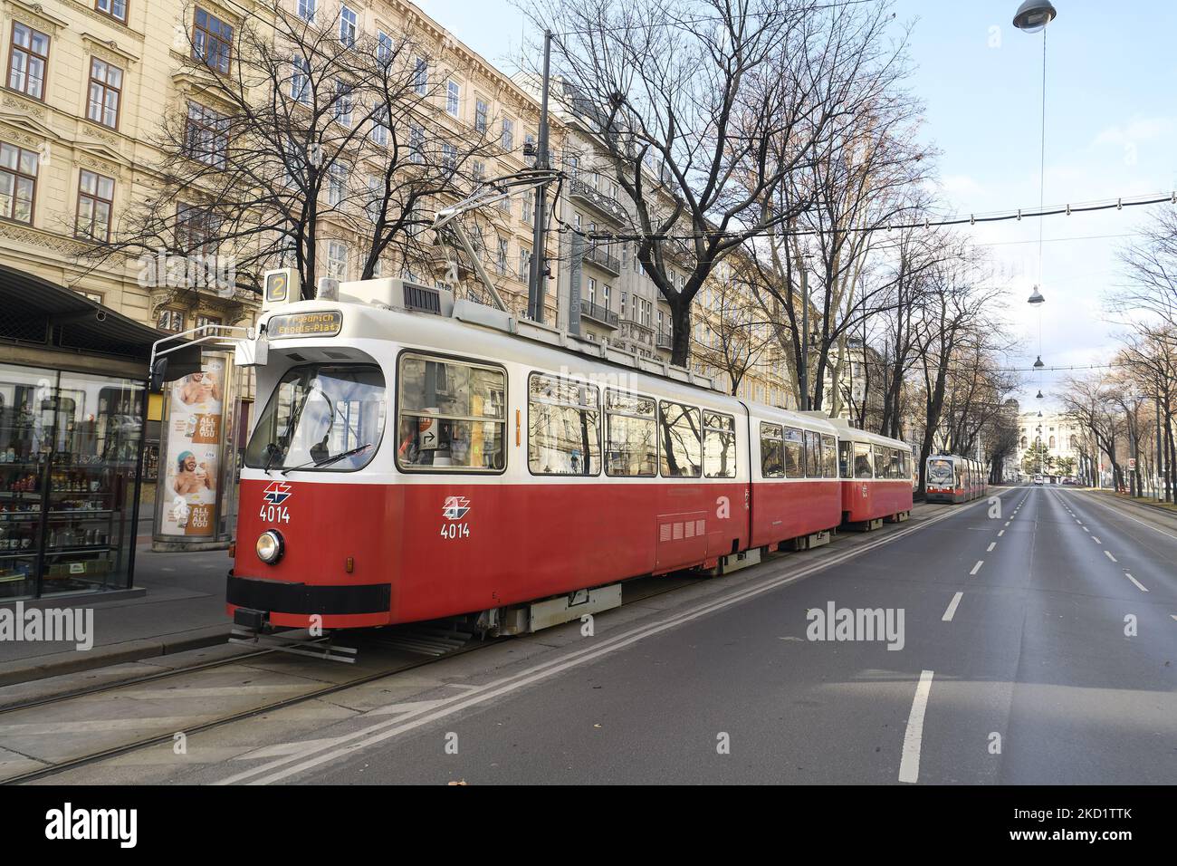 Traditional Viennese tram on Opernring street in the historic center of ...
