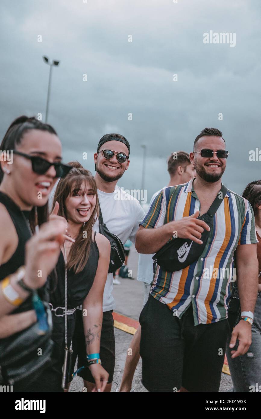 A group of young attractive people smiling during the electronic music ...