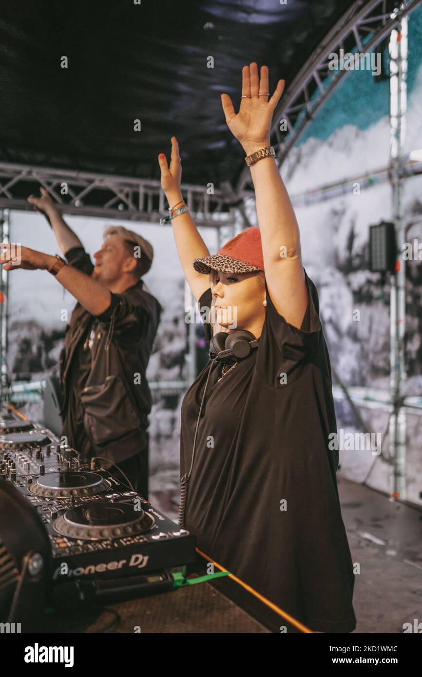 Two male DJs on the stage during the electronic music festival ...
