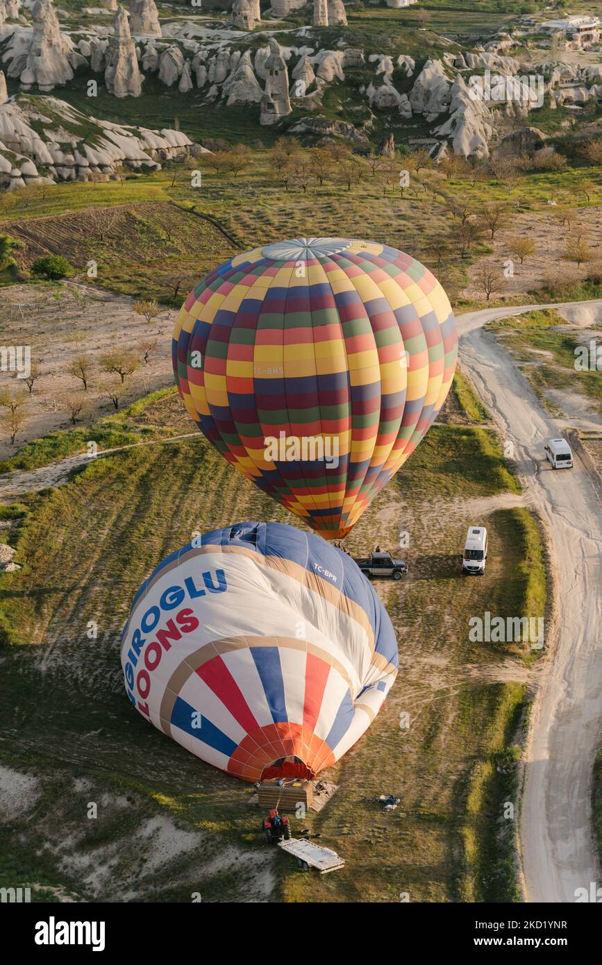 Hot air balloon flying over spectacular Cappadocia, Uchisar castle in ...