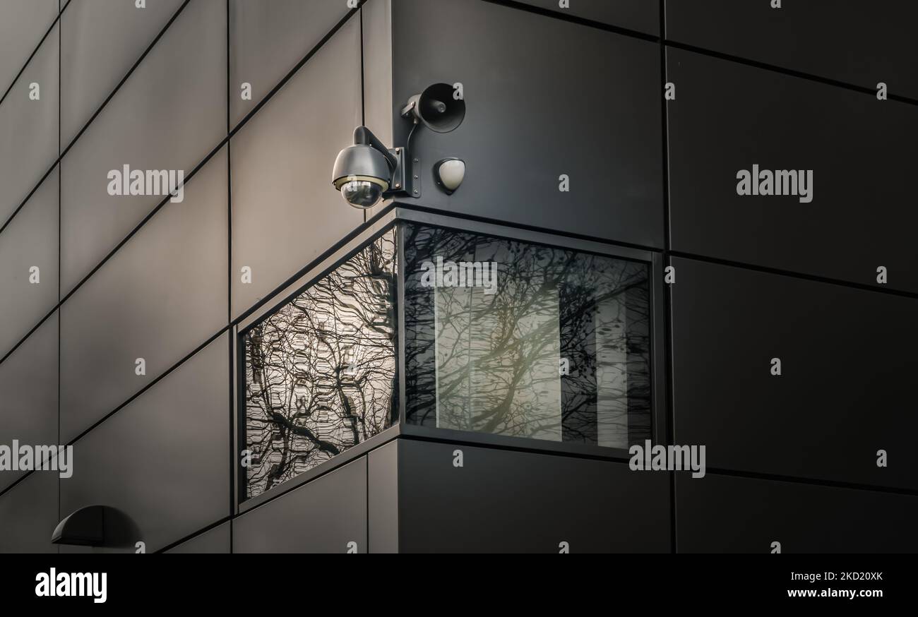 Surveillance camera for mounted on outside wall of Modern building. The ...