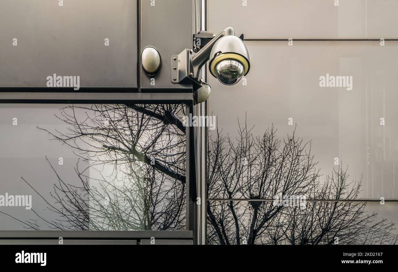 Surveillance camera for mounted on outside wall of Modern building. The ...