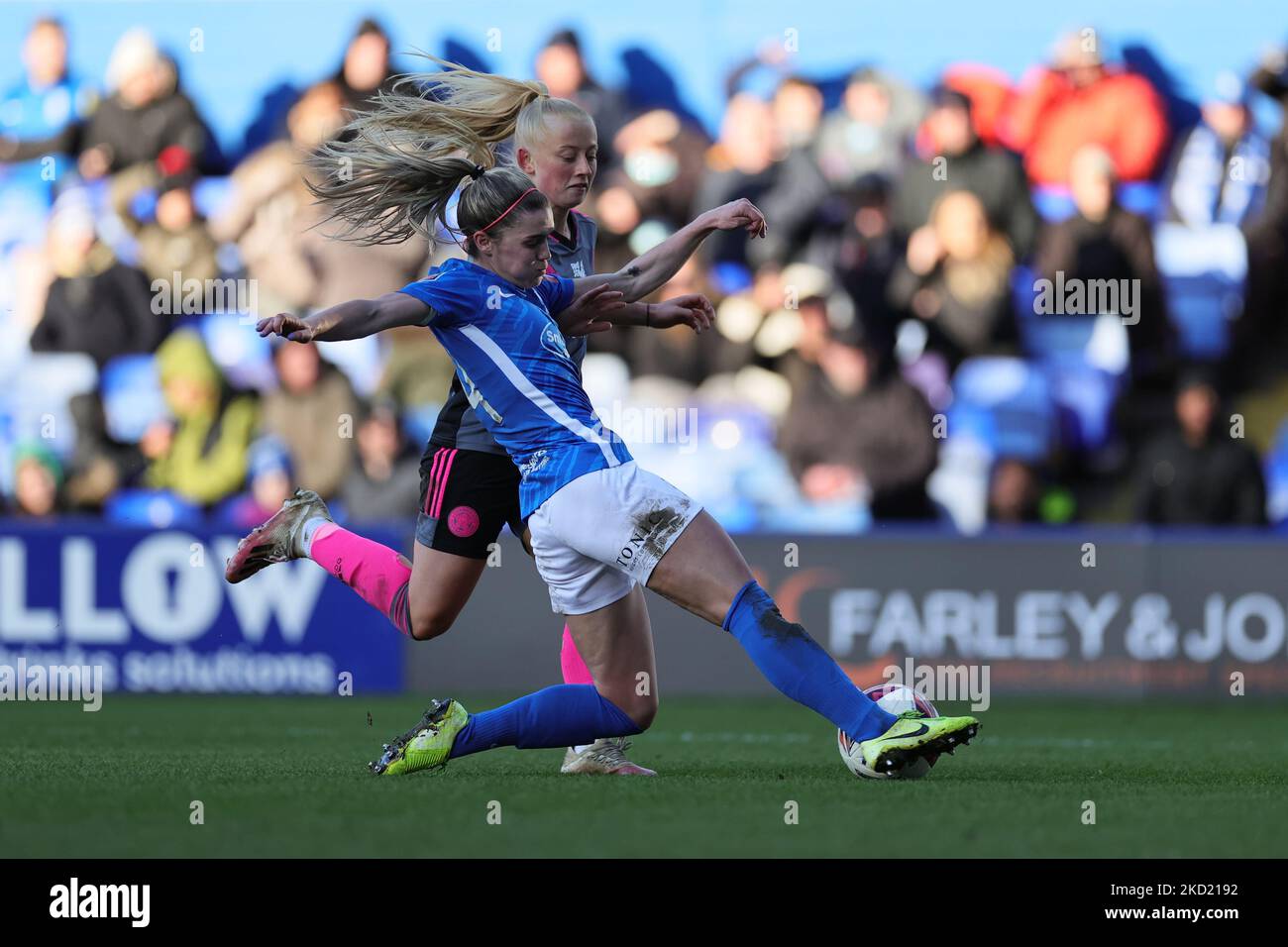 . Jamie Finn of Birmingham City challenges Freya Gregory of Leicester ...