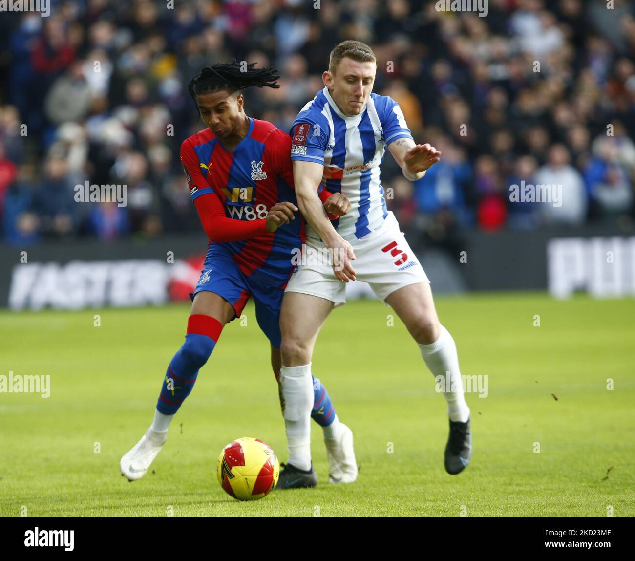 L-R Crystal Palace's Michael Olise tussle with David Ferguson of ...