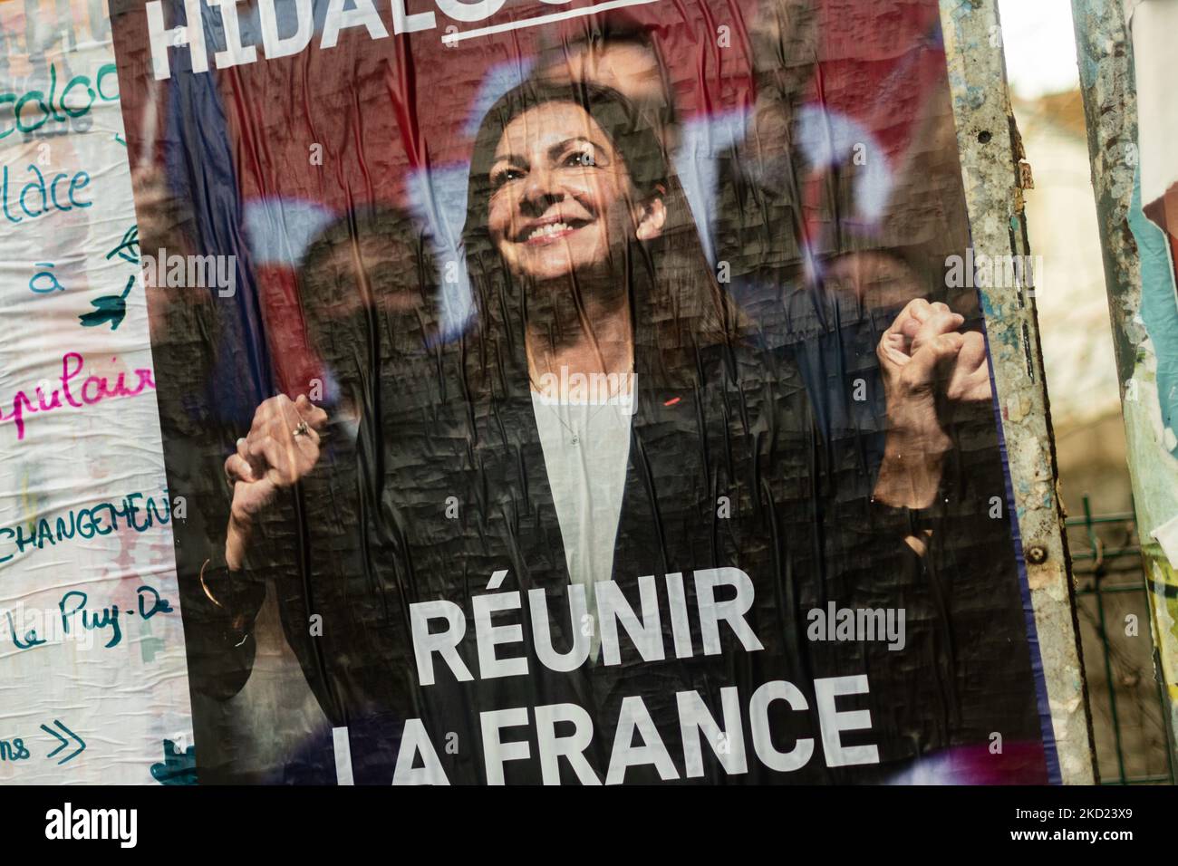 Political campaign poster of Anne Hidalgo, glued the night before her ...