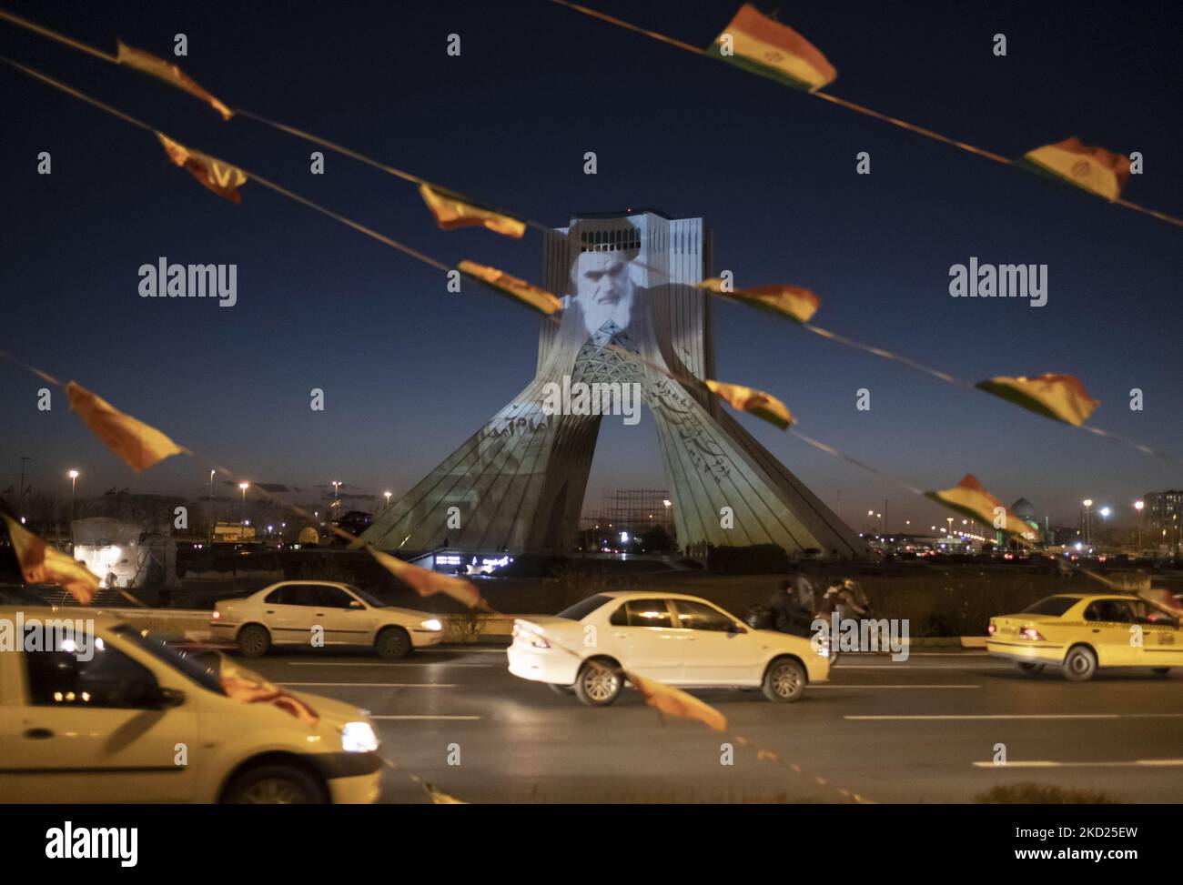 A portrait of Iran’s Late Leader Ayatollah Ruhollah Khomeini is ...