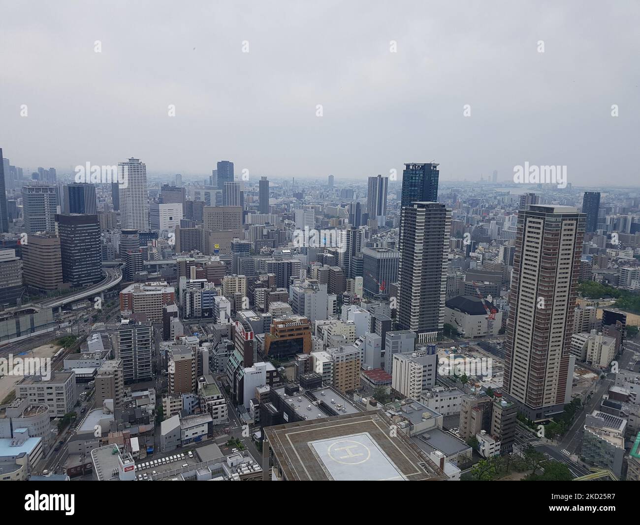 An aerial view of the skyline and skyscrapers in downtown Osaka, Japan ...